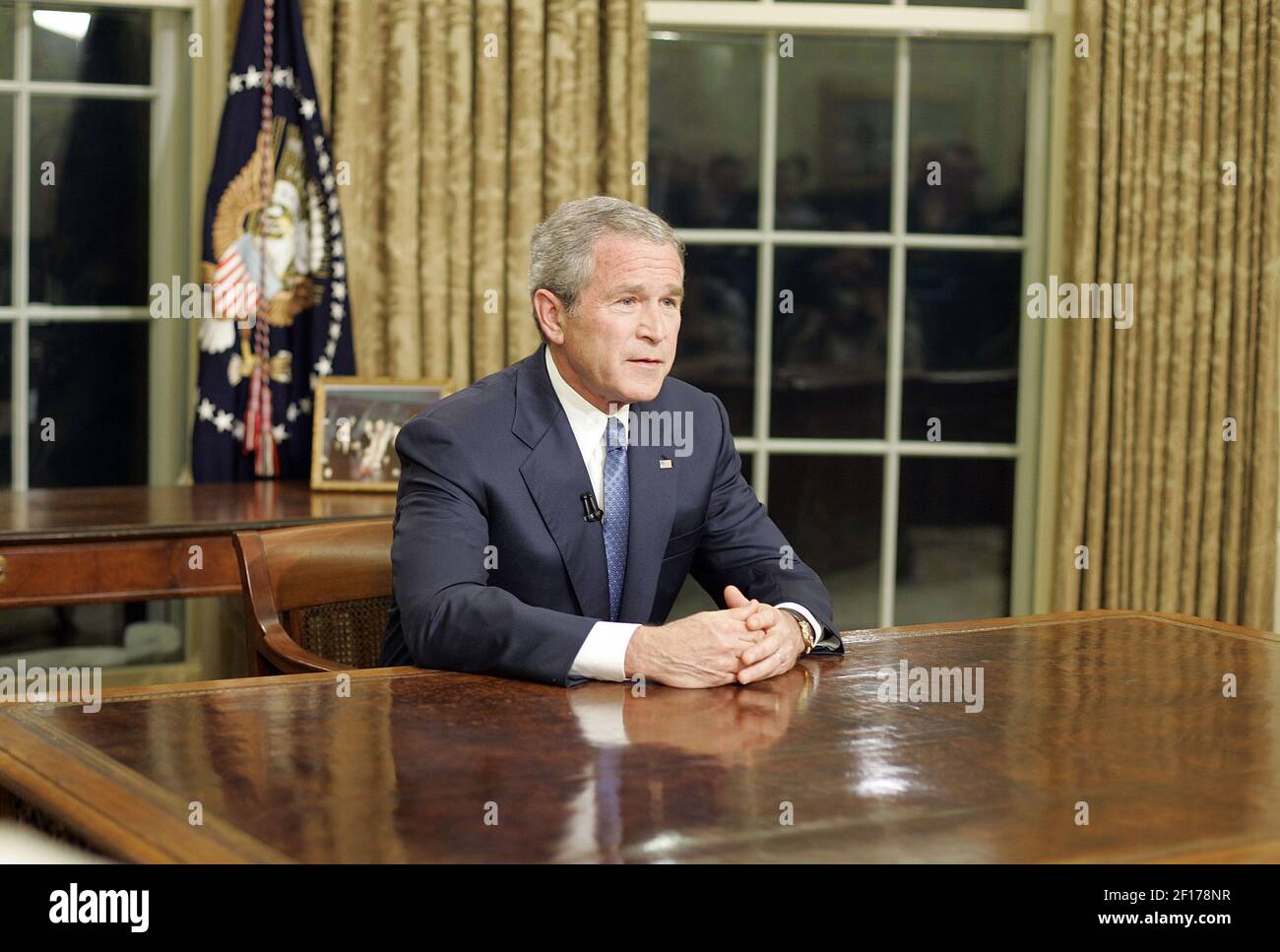 President George Bush poses for a still photo after delivering a ...