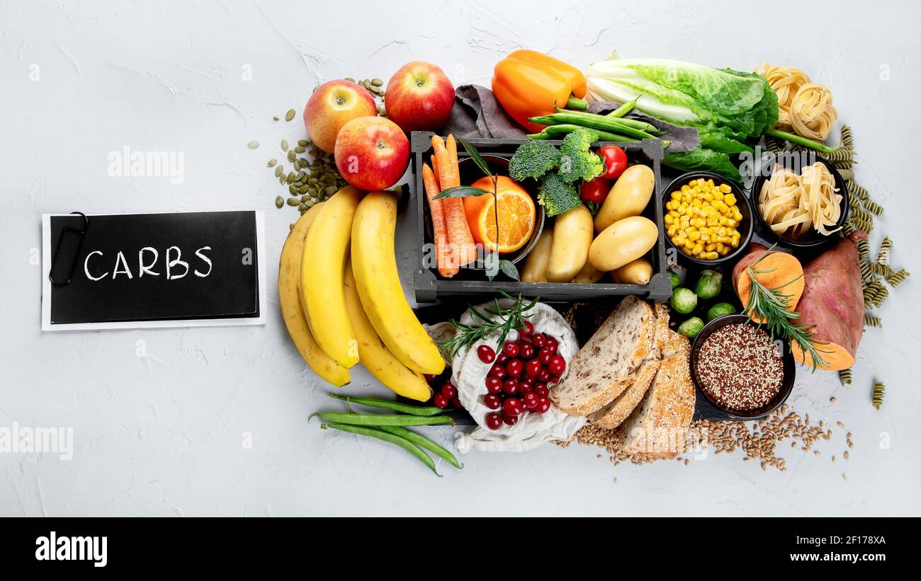Best sources of carbs on light gray background. Healthy food concept ...
