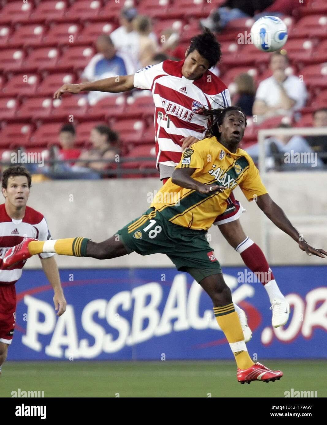FC Dallas's Alex Yi and Los Angeles Galaxy Joseph Ngwenya go up for the ...