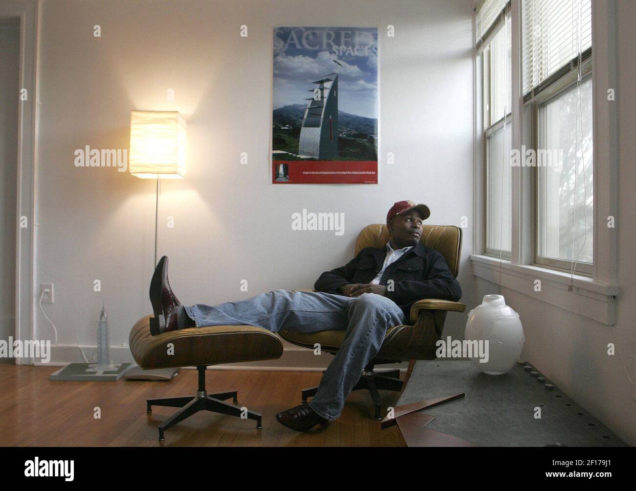 Llewellyn enjoys views of the Cascade Mountains from his vintage Eames ...