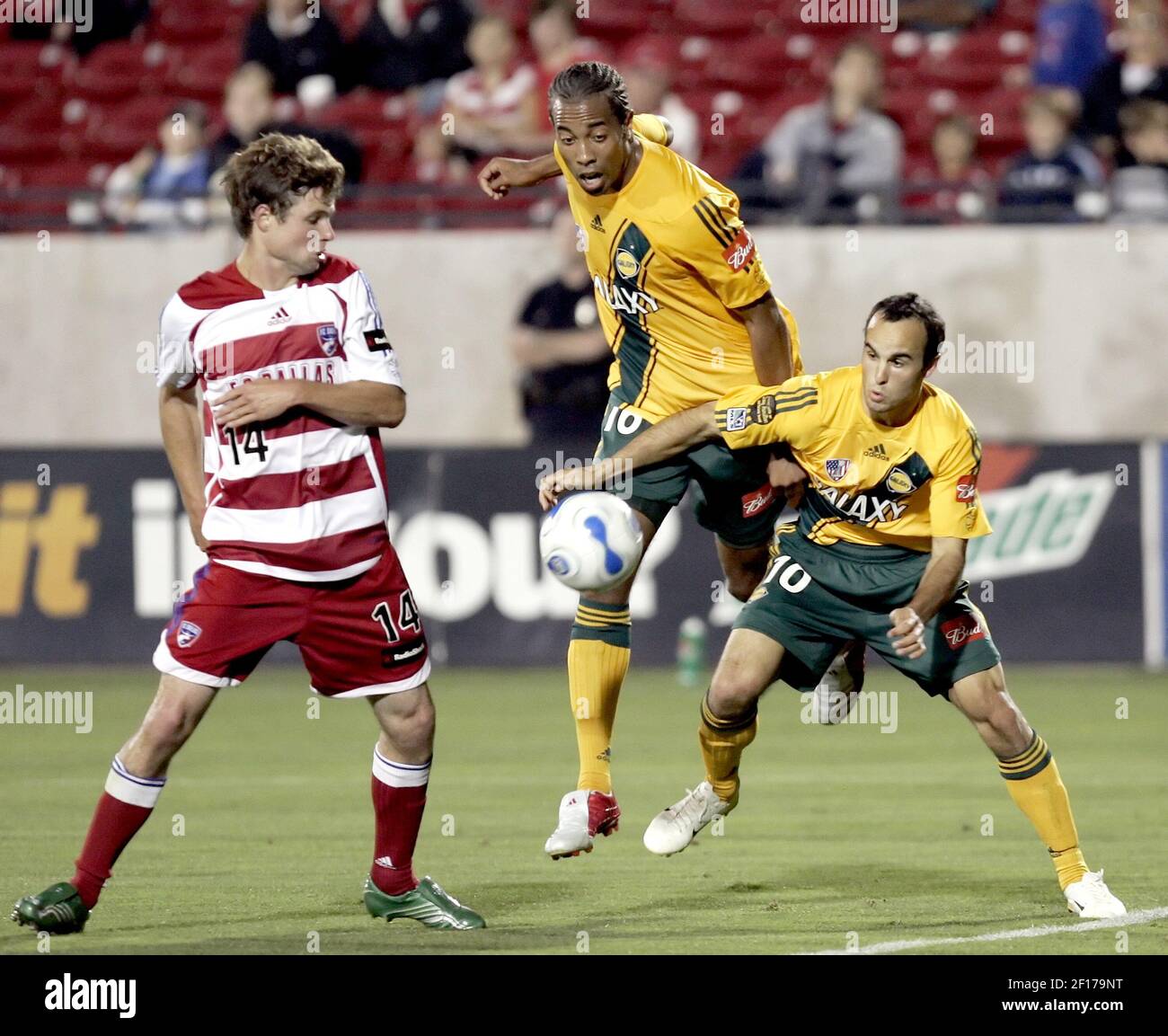Los Angeles Galaxy's Landon Donovan, right, and Kyle Veris, center ...