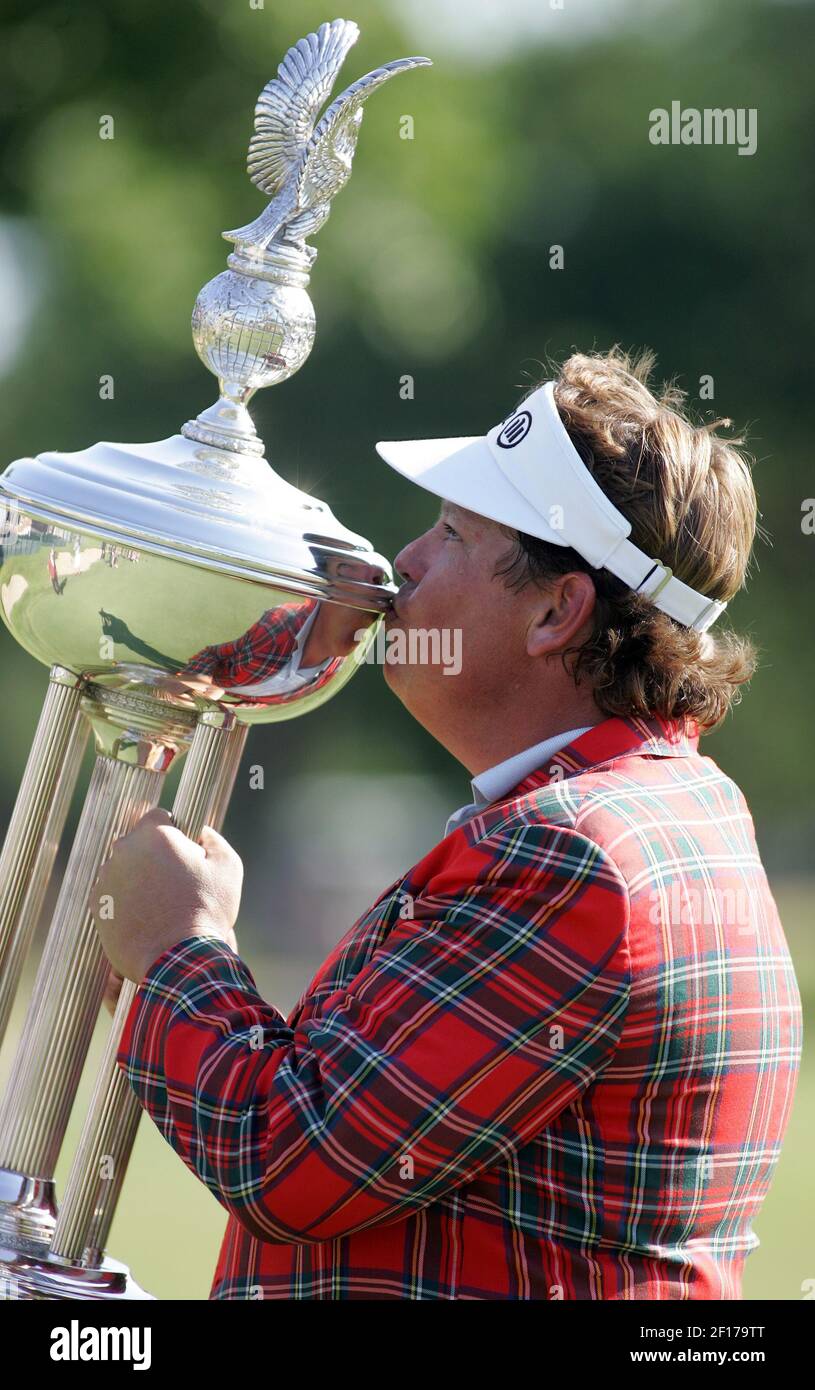 Tim Herron kisses his trophy after winning a sudden death playoff at ...