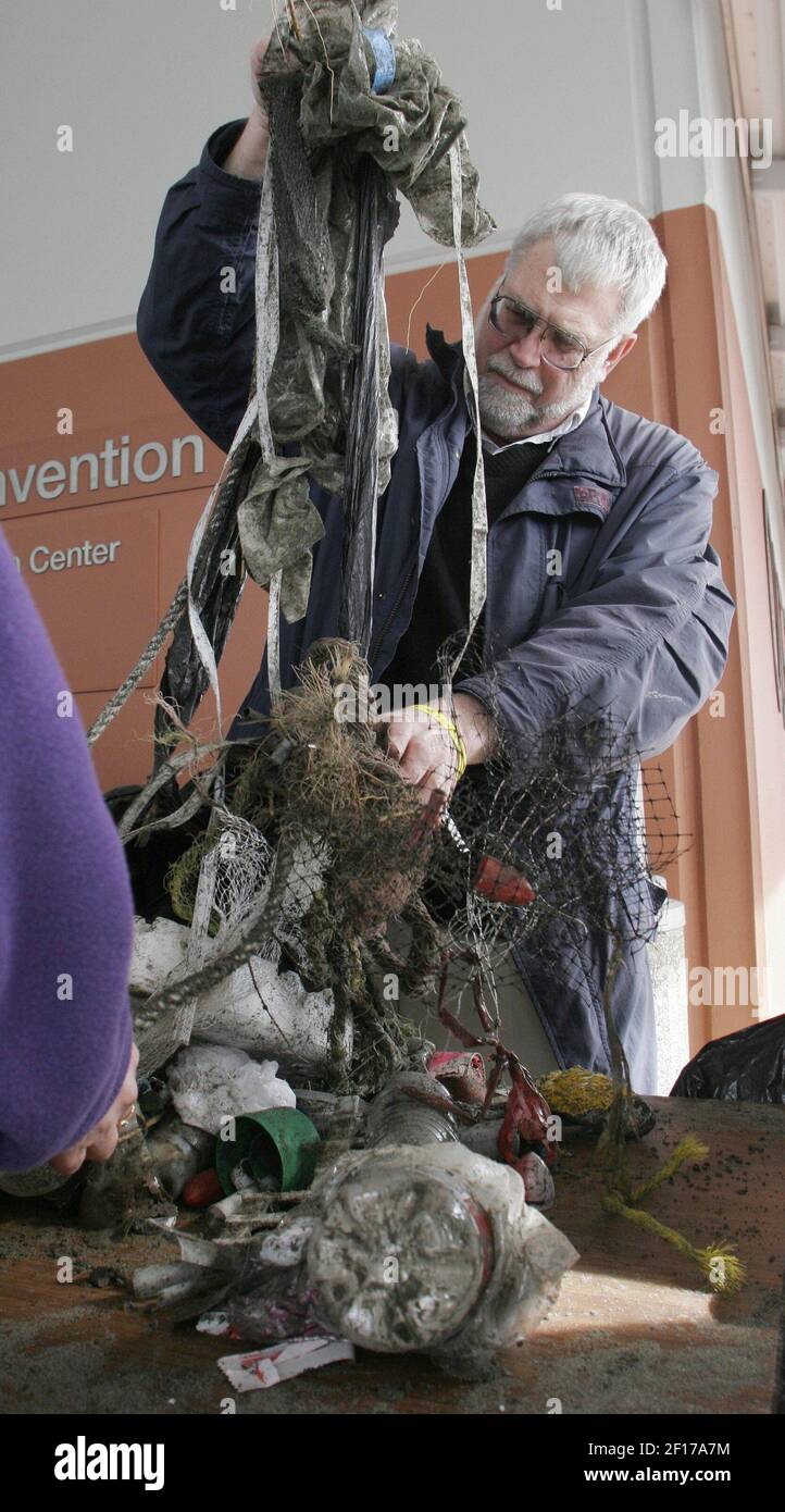 Retired marine biologist Curtis Ebbesmeyer looks through trash ...