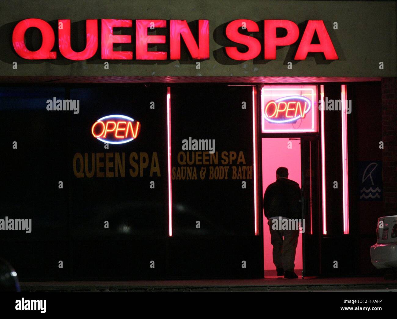 A man enters the Queen Spa Sauna and Body Bath on Northwest Highway in ...
