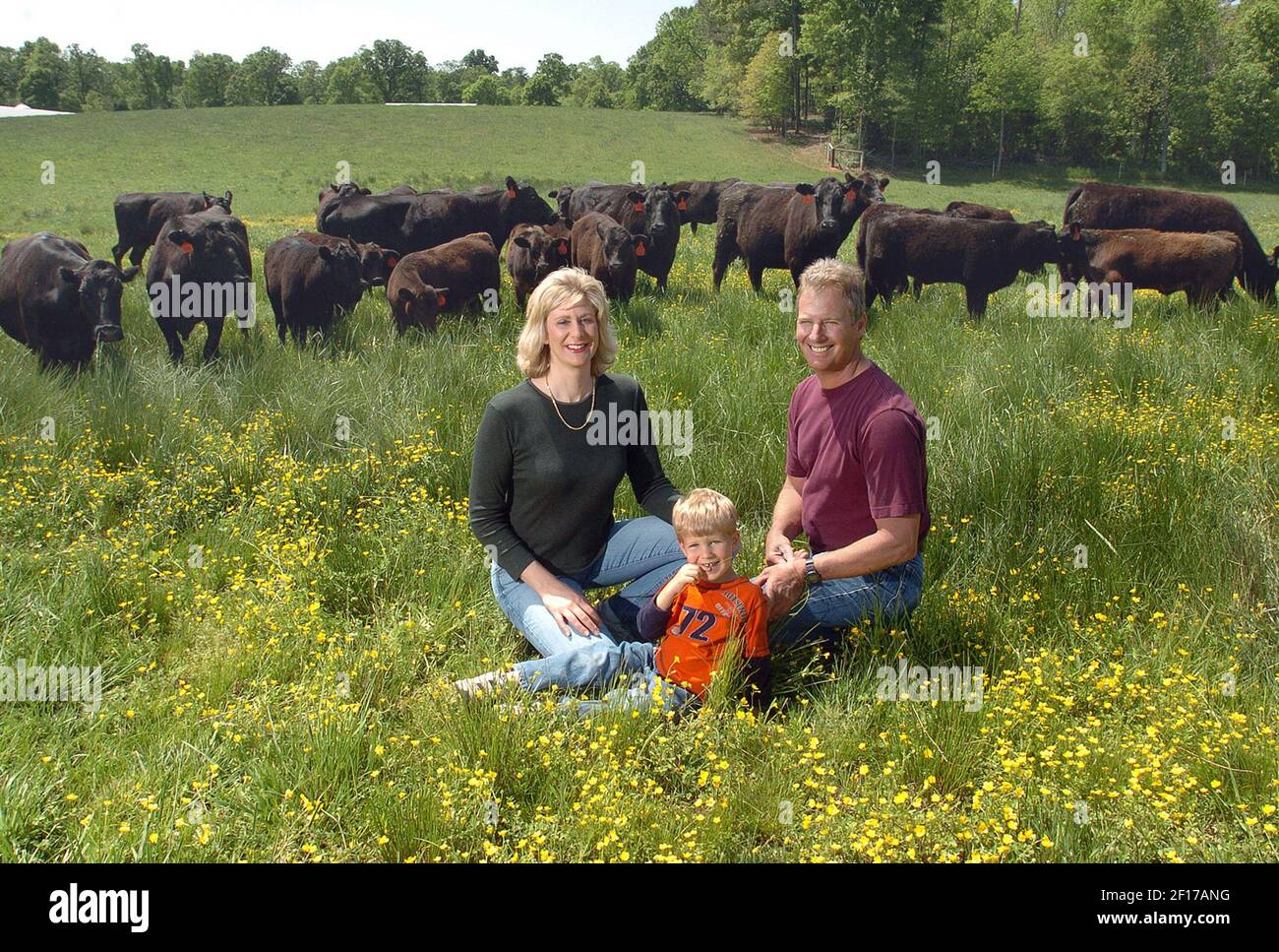 Harriett and Milton Baucom and their son, Bayden, pose with some of the ...