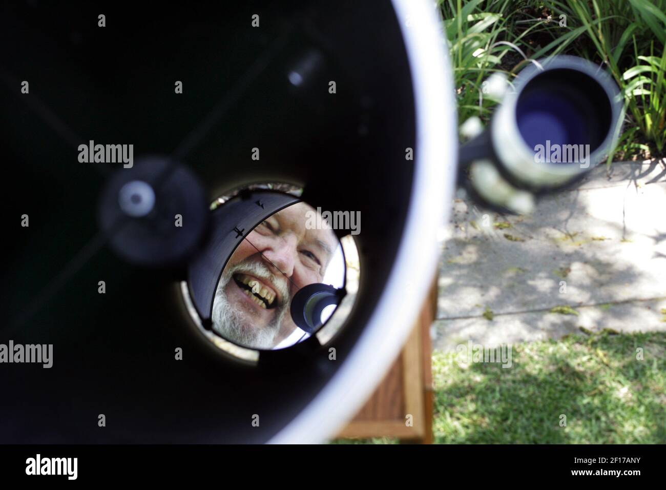 Amateur astronomer Larry Adkins, 66, of Tustin, California poses ...