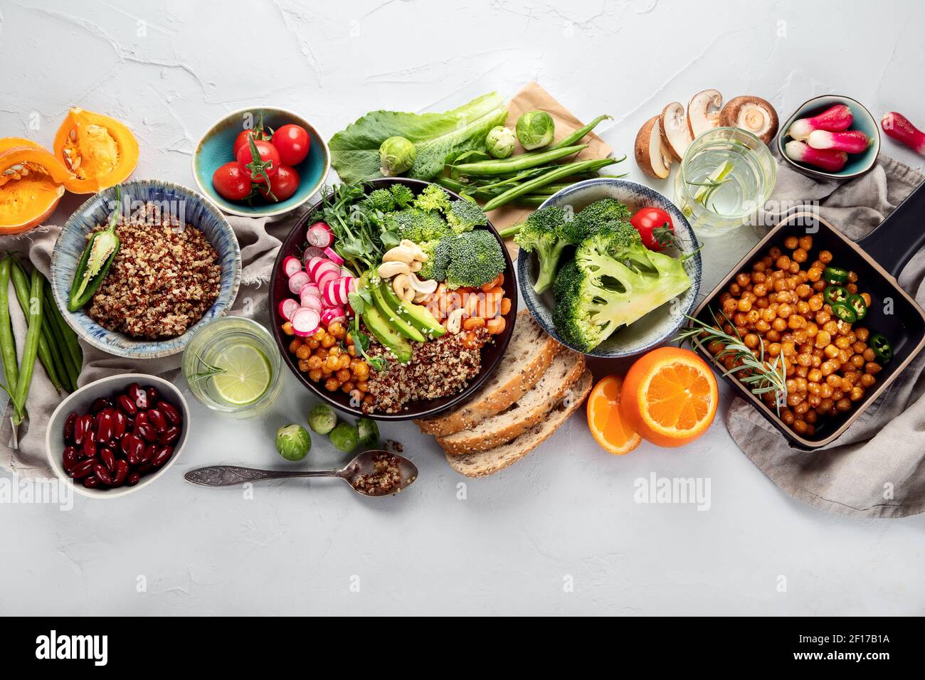 Fresh and healthy vegan table with chickpea, buddha bowl, pumpkins ...