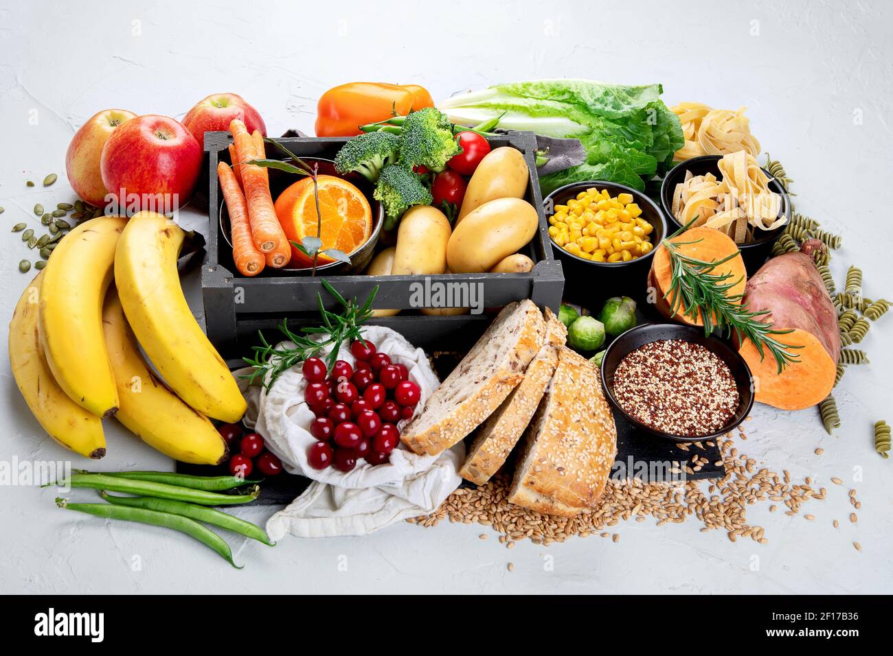 Best sources of carbs on light gray background. Healthy food concept ...