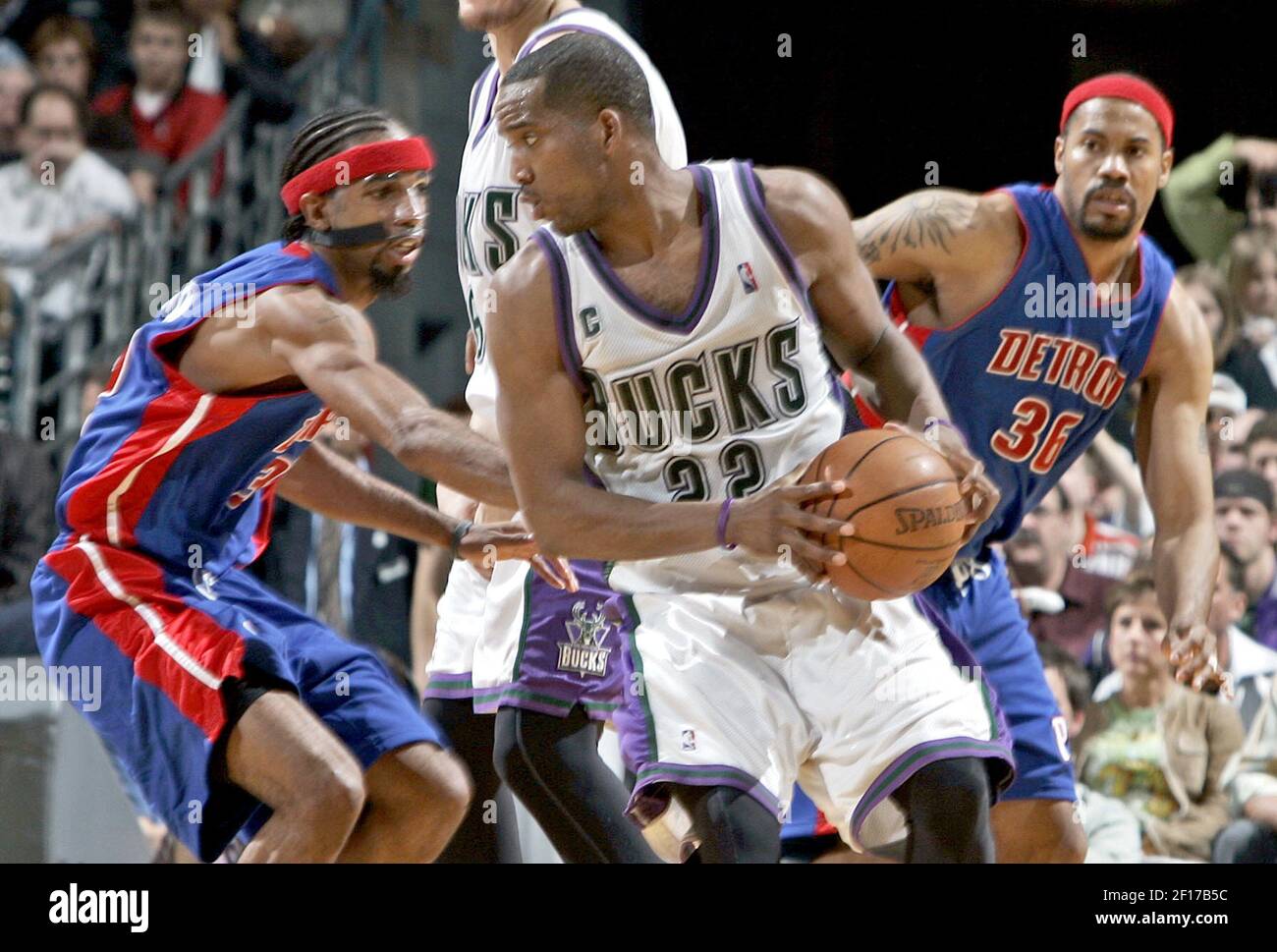 Milwaukee Bucks' Michael Redd gets pressure from Detroit Pistons' Ben ...