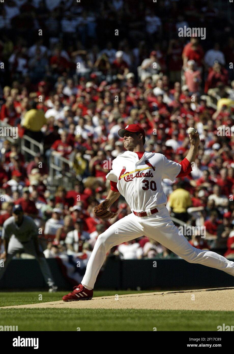 St. Louis Cardinals pitcher Mark Mulder throws the first pitch at the ...