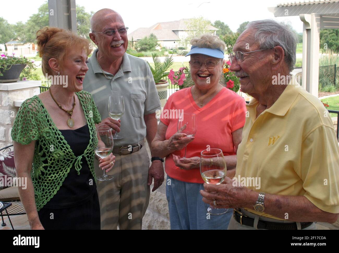 Harold Taylor, right, and his wife, Alva, enjoy a glass of wine with ...