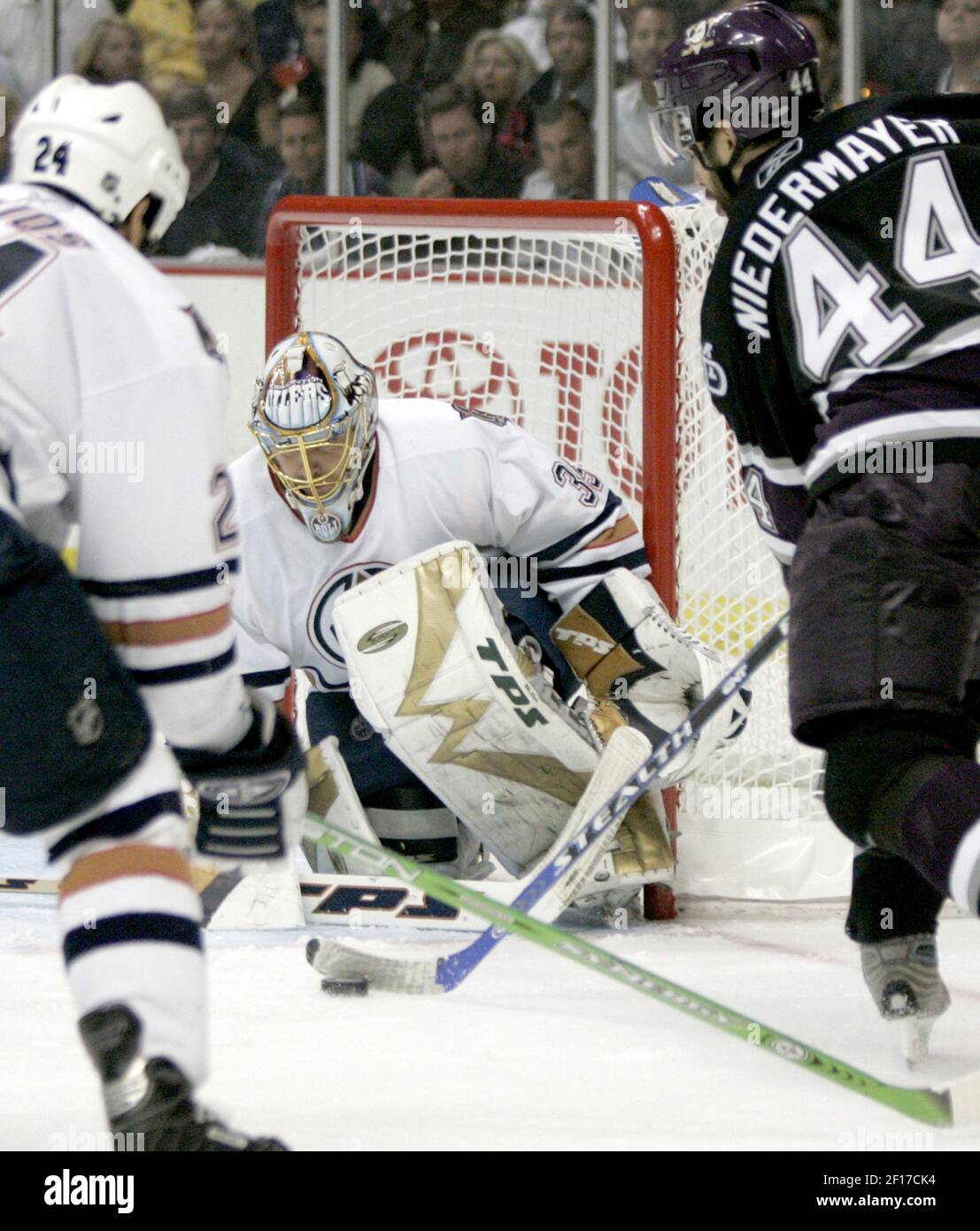 Edmonton Oilers' goalie Dwayne Roloson stops a Anaheim Mighty Ducks ...