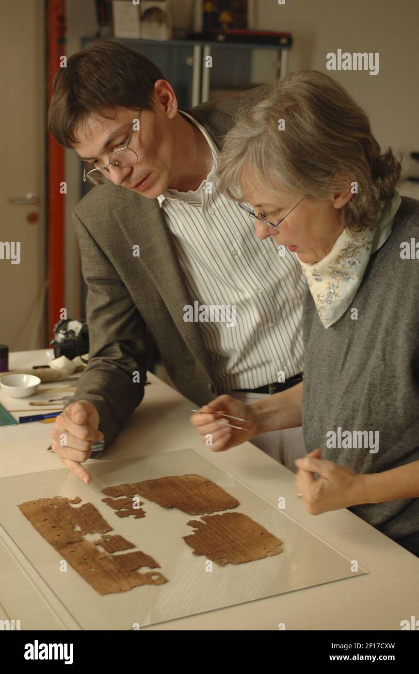 Florence Darbre, conservator of the manuscript, works with Coptologist ...