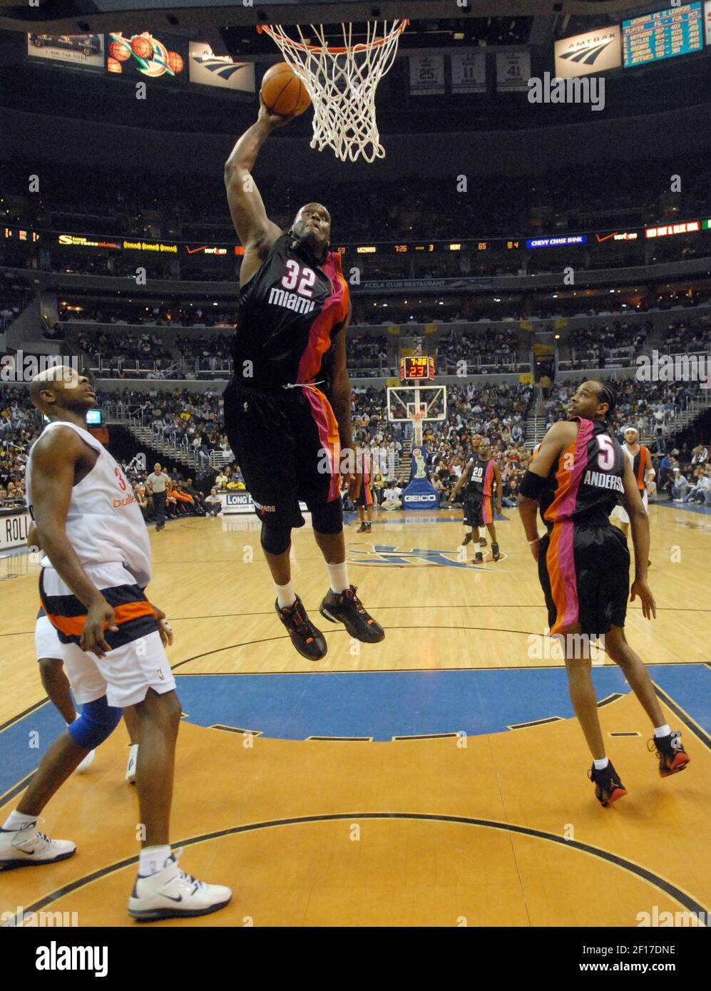 Miami's Shaquille O'Neal dunks the ball against Washington in the ...