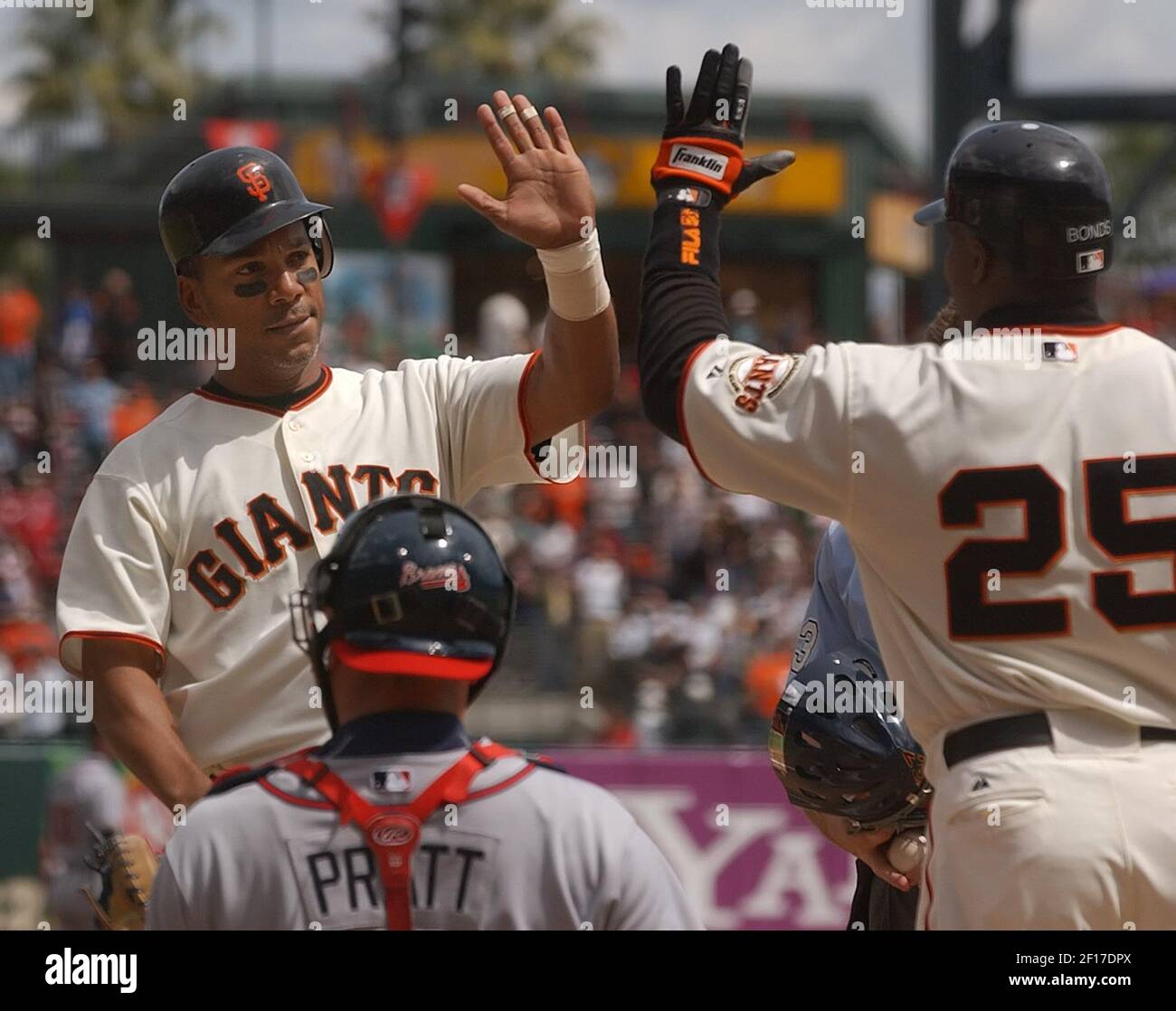 San Francisco Giants' Barry Bonds (25) congratulates teammate Moises ...