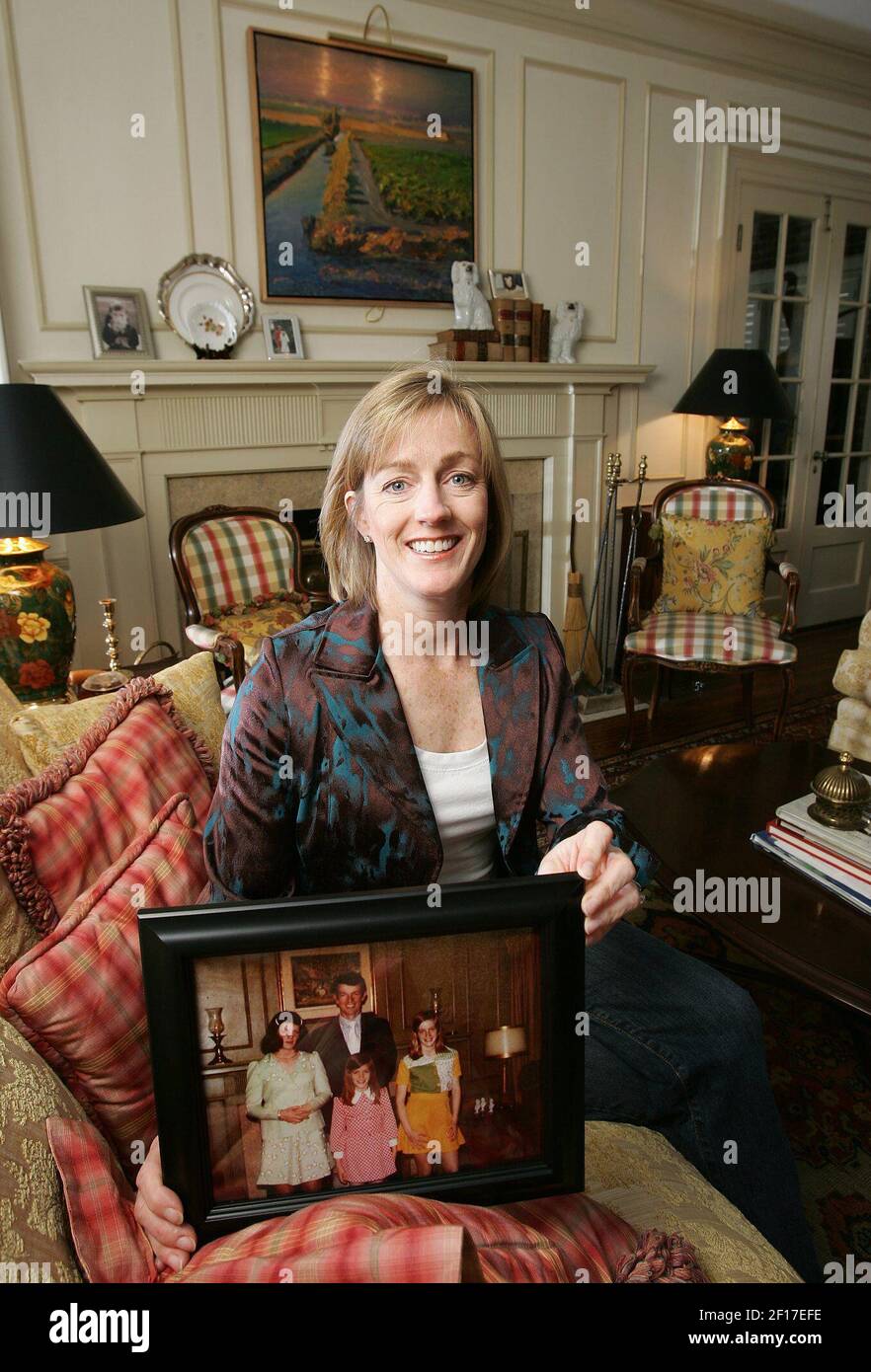 Kathleen Wiedeman, of Kansas City, displays an old family photo taken ...
