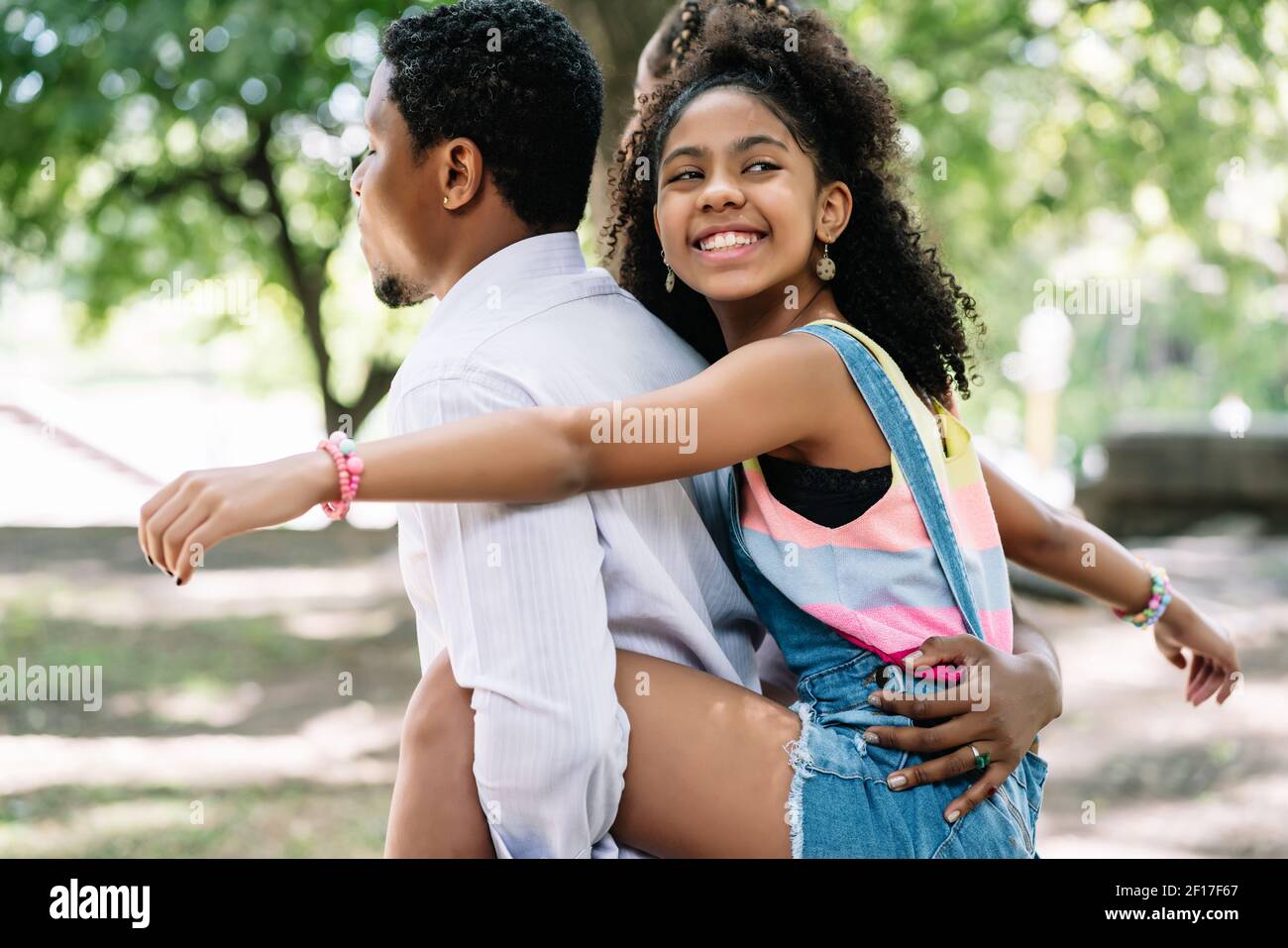 Family enjoying a day together at the park Stock Photo - Alamy