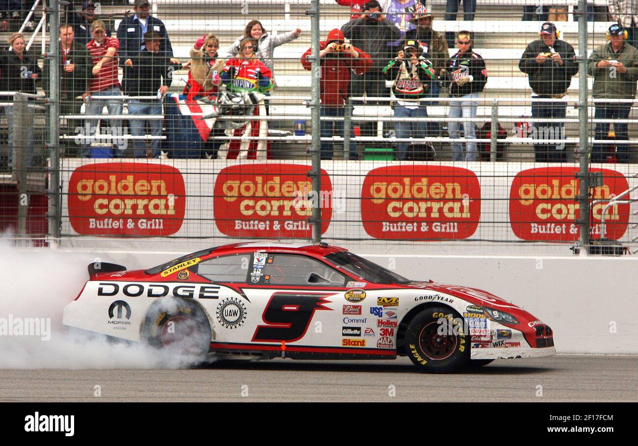 NASCAR driver Kasey Kahne does a victory turn out after winning the ...