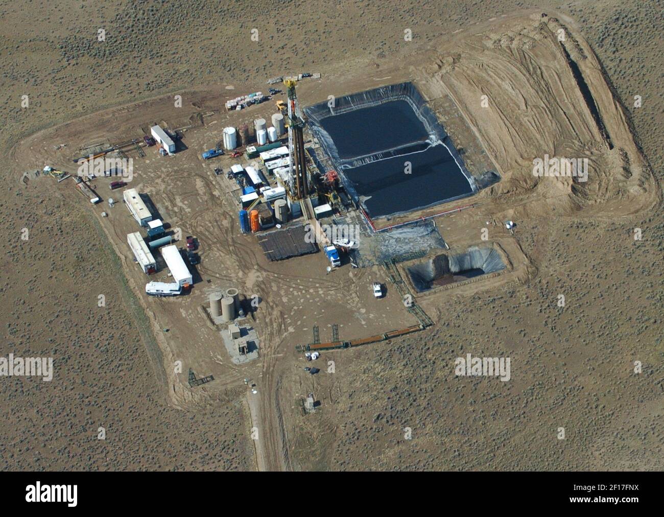 A rig, pictured in August, 2005, is setup on a pad to drill for natural ...