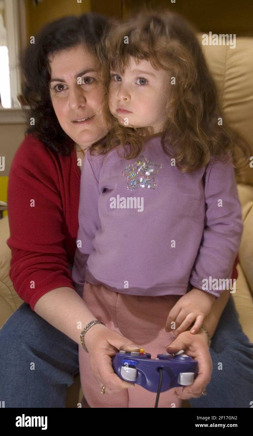 Rosanne Corcoran, left, and her daughter Erin play a Super Mario ...