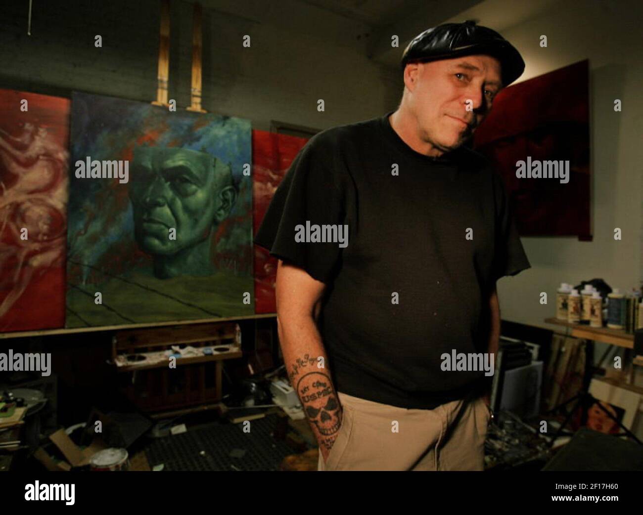 Ned Broderick in his studio with two of his paintings, "A Heightened ...