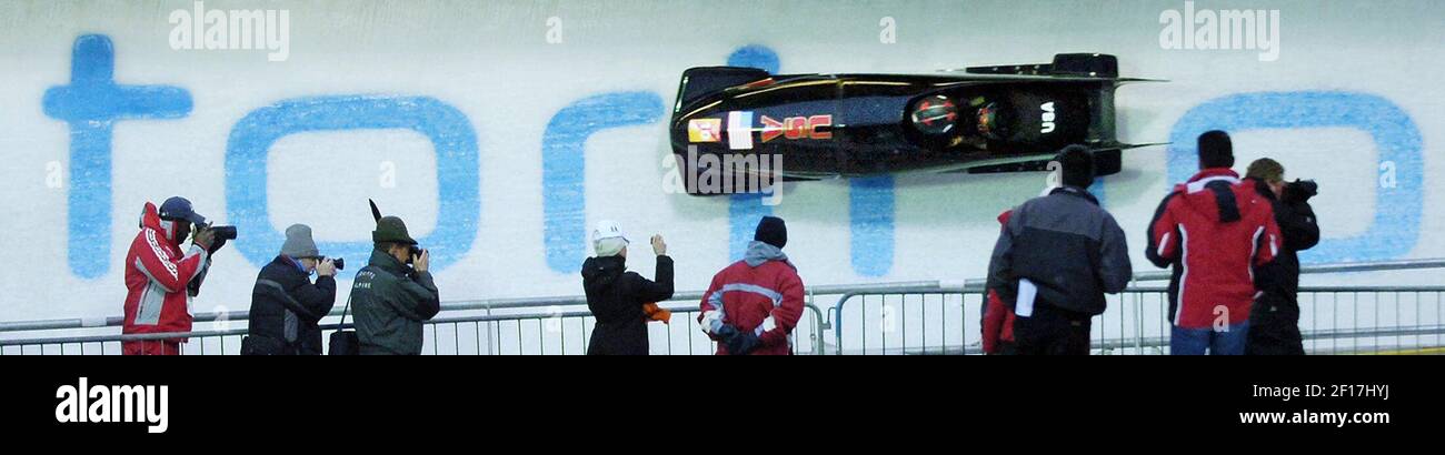Shauna Rohbock and Valerie Fleming in the USA-1 bobsled take curve 14 ...