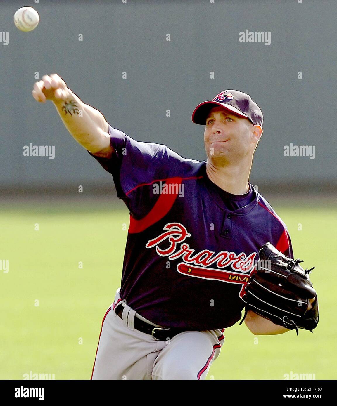 Atlanta Braves' pitcher Tim Hudson watches the release of his throw ...