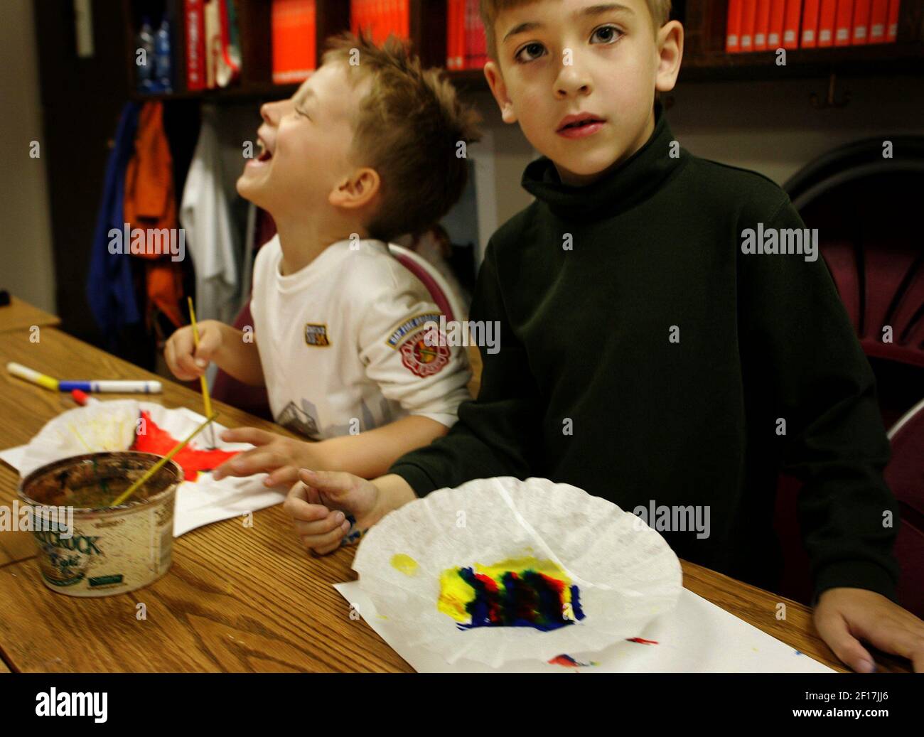 Preston Williams, 5, left, and Corbin Marcus, 6, attend class in the ...