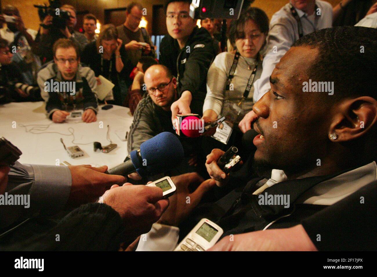 Cleveland Cavaliers All-Star LeBron James (right) answers questions ...