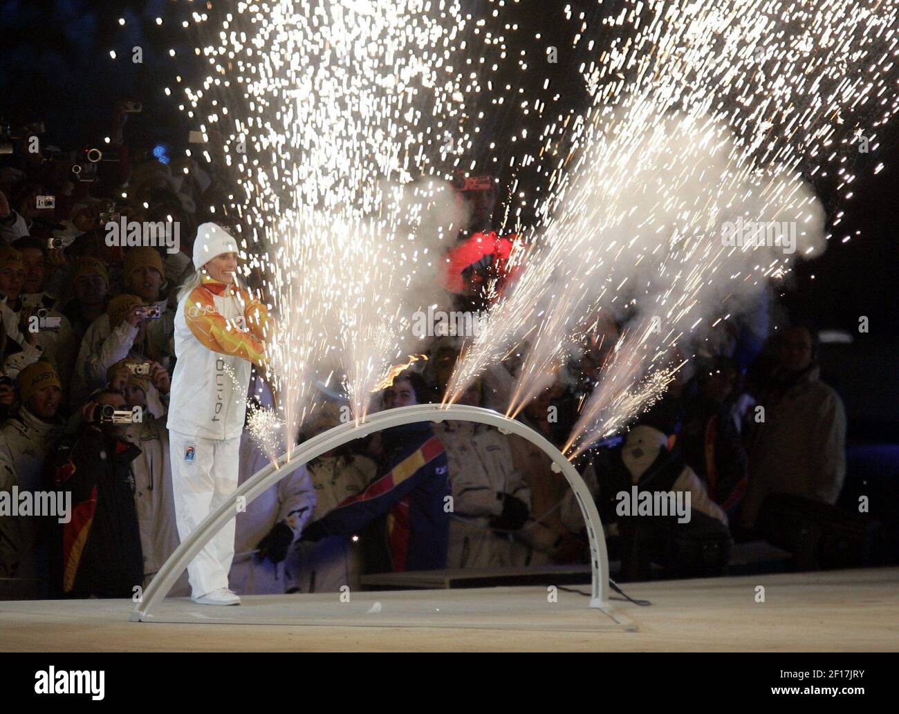 Italy's Stefania Belmondo, 10-time Olympic medalist, lights the Olympic ...