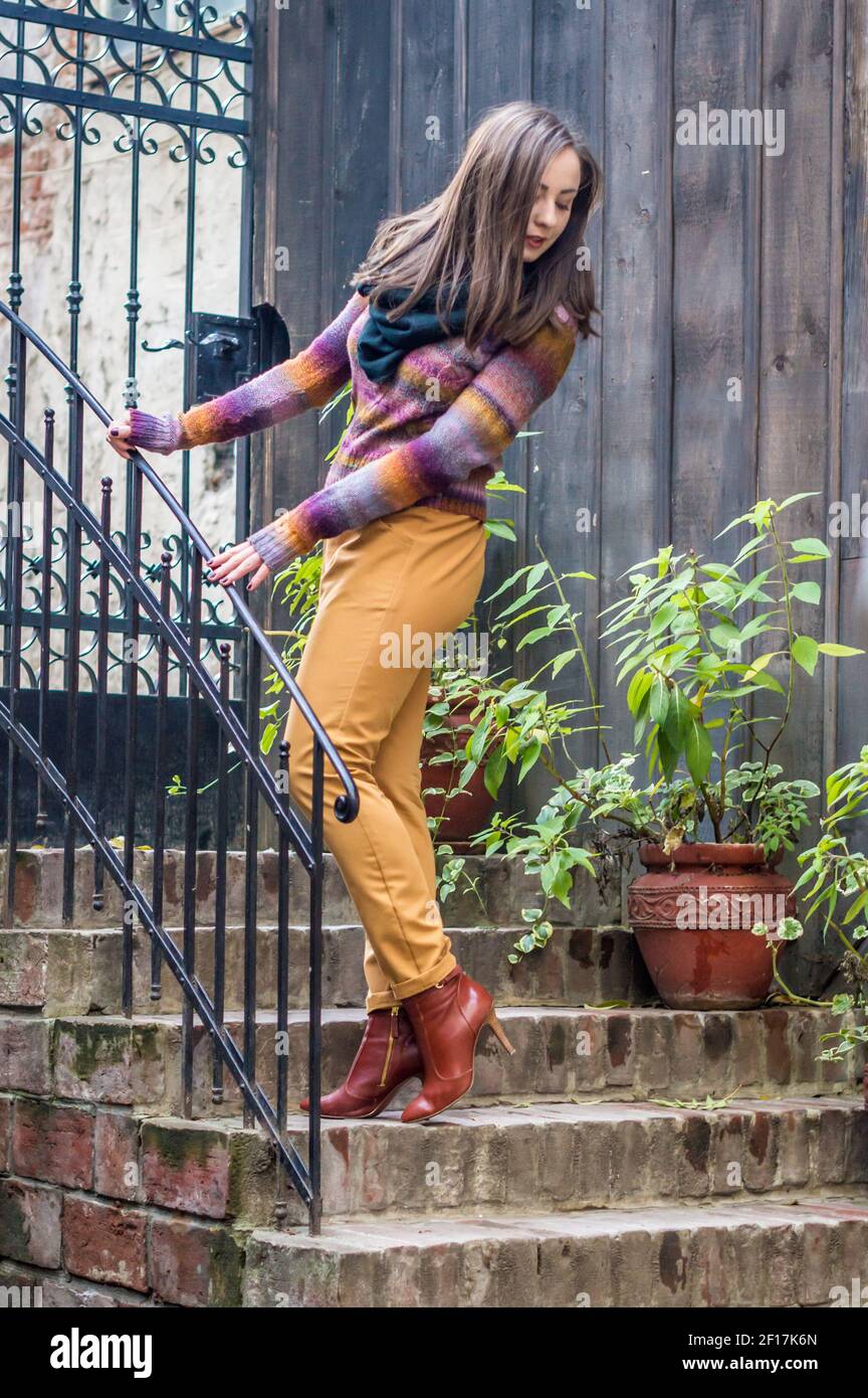 Person ascending stairs hi-res stock photography and images - Alamy
