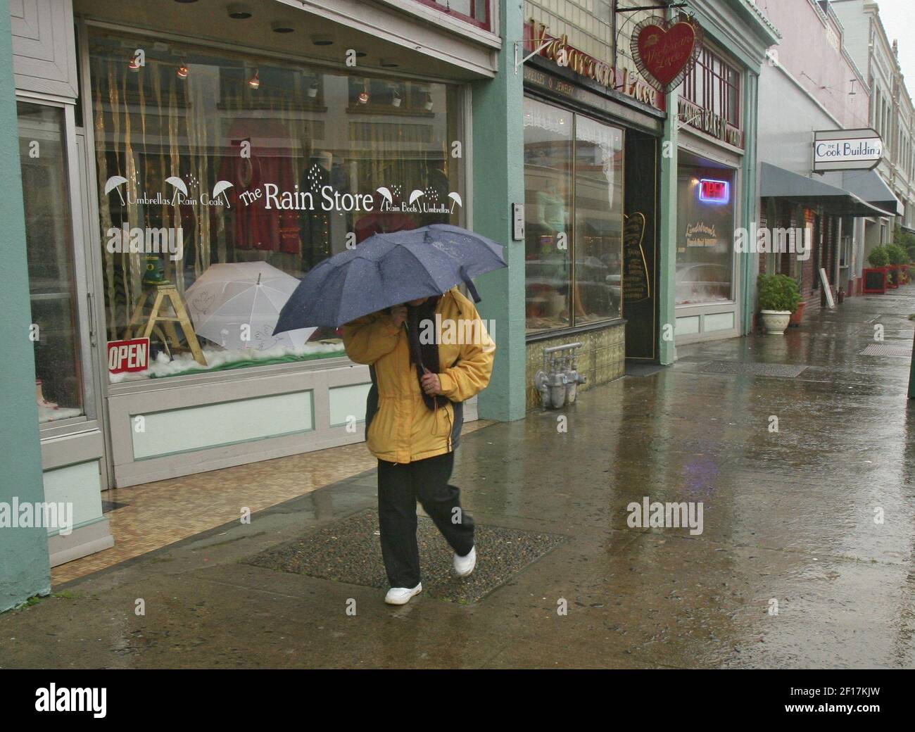 Shops line Commercial Street in downtown Astoria, Orgeon and nearly all ...