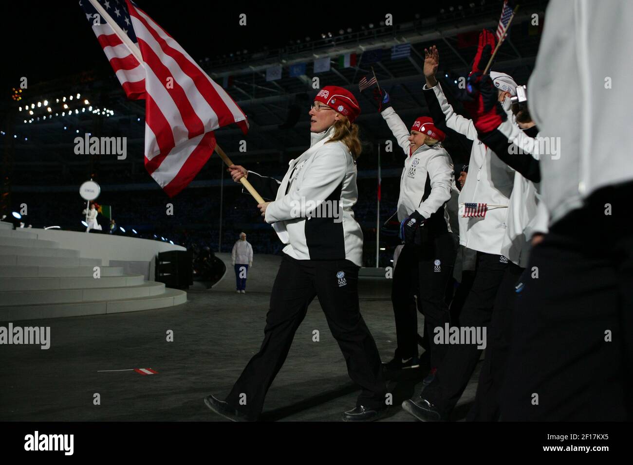 USA speedskater Chris Witty carries the flag as the USA team enters ...