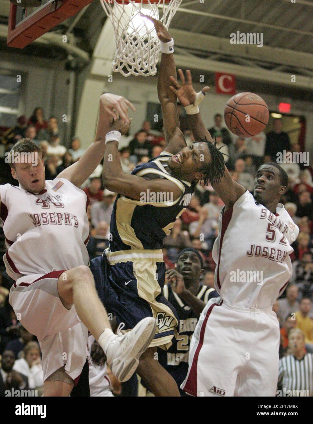 Saint Joseph's Dave Mallon, left, and teammate Rob Ferguson, right ...