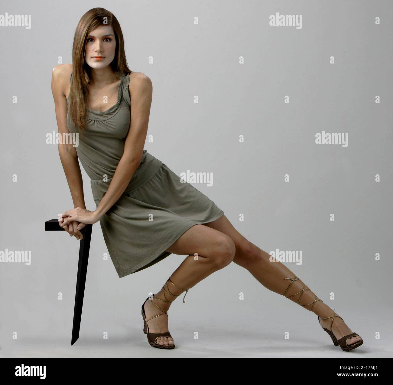 Penelope models a skirt and tank by James Perce, $87 and $55; Kenneth ...