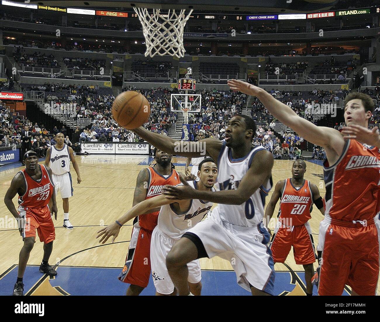 Washington Wizards Gilbert Arenas (0) scores in front of Charlotte ...