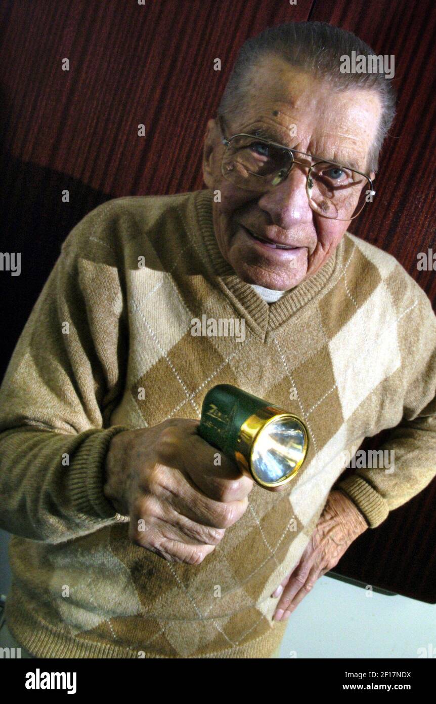 Remote inventor Eugene Polley with his invention, the "flash-matic ...