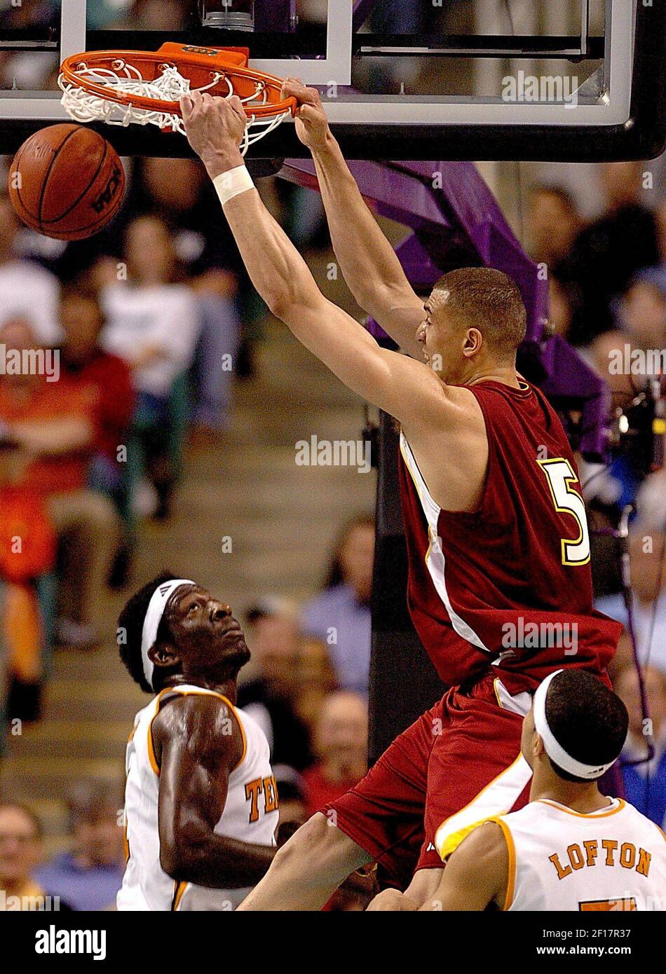 Winthrop's Craig Bradshaw slam dunks the ball on Tennessee's Major ...