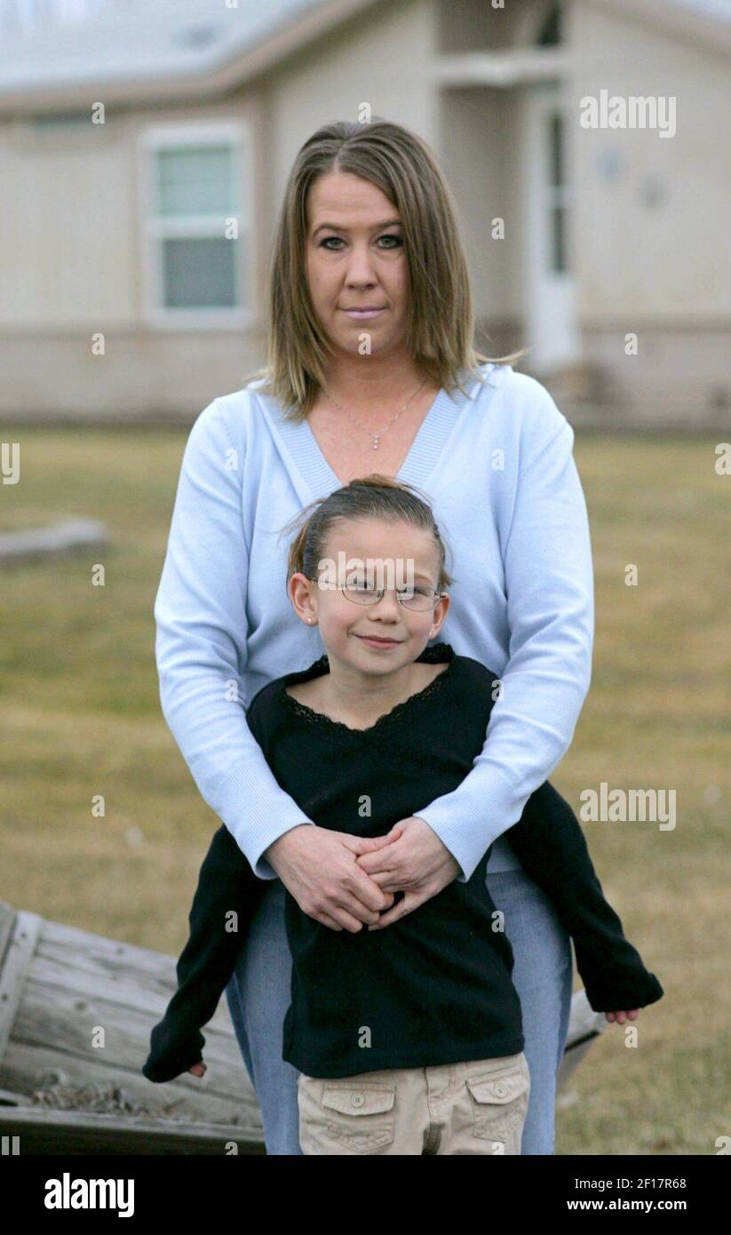 Julie Garibay, top, and her daughter Rylee, stand in front of their ...