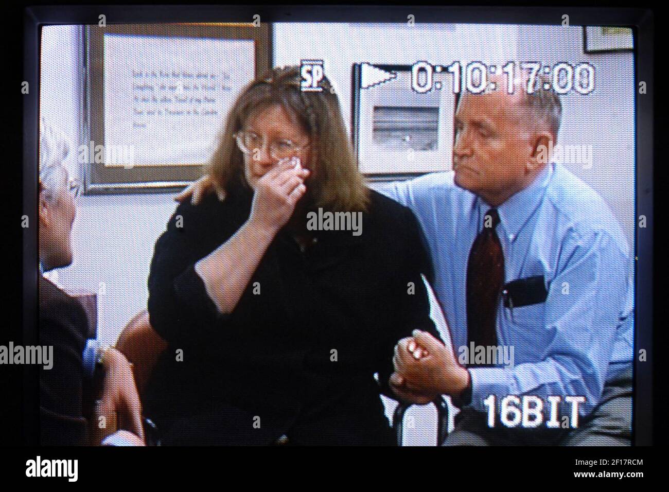 Actors Robyn Maloney-George, (center) and Frank Gallagher (right) are ...