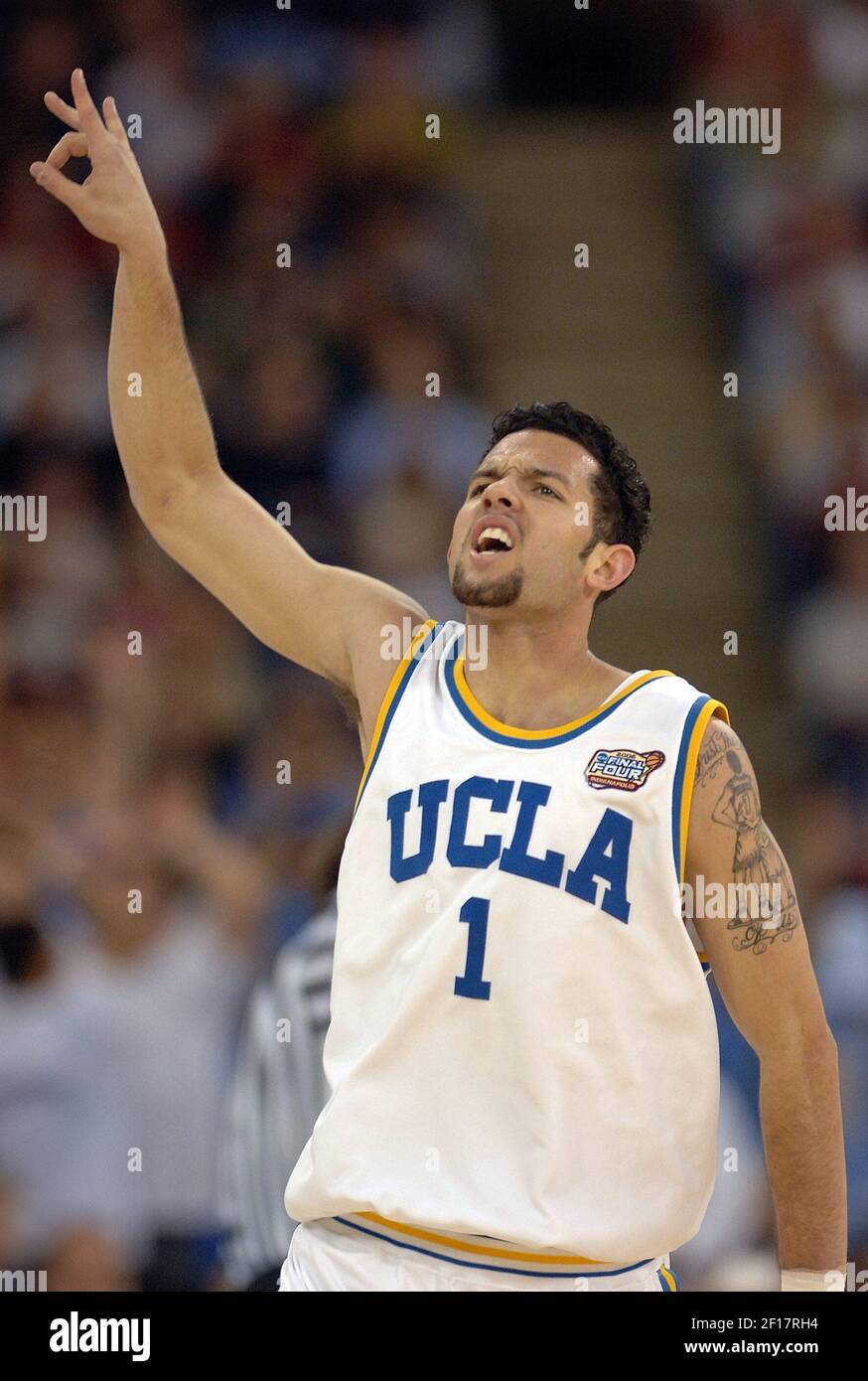 UCLA's Jordan Farmer acknowledges the three-point shot in the ...