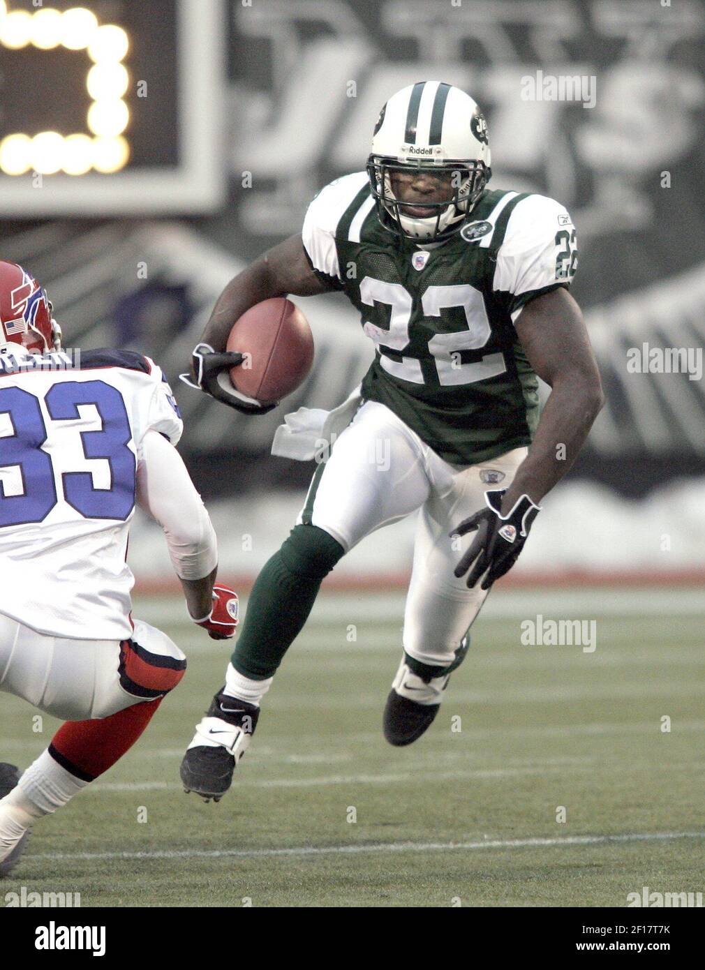 New York Jets' Justin Miller runs for a touchdown on a kick return ...