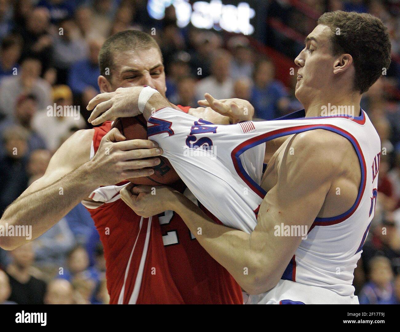 Nebraska's Aleks Maric, left, and Kansas' Sasha Kaun battle for the ...