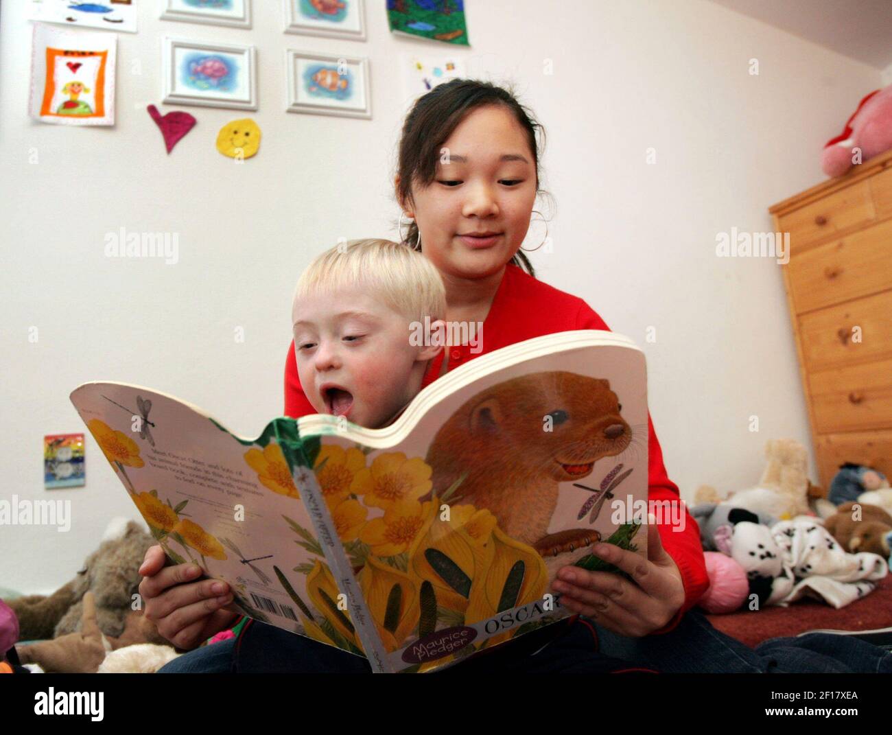 Down syndrome family photo hi-res stock photography and images - Alamy