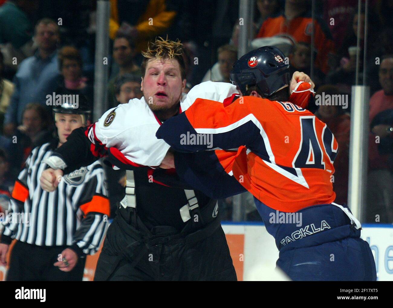 Ottawa Senators' Brian McGrattan fights with New York Islanders' Eric ...
