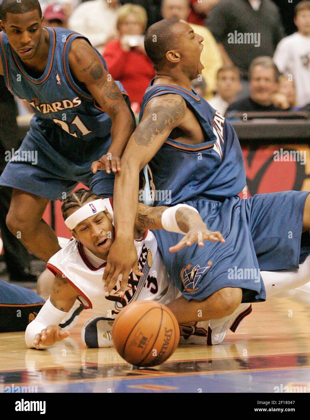Washington Wizards' Caron Butler screams as he twists his ankle under ...