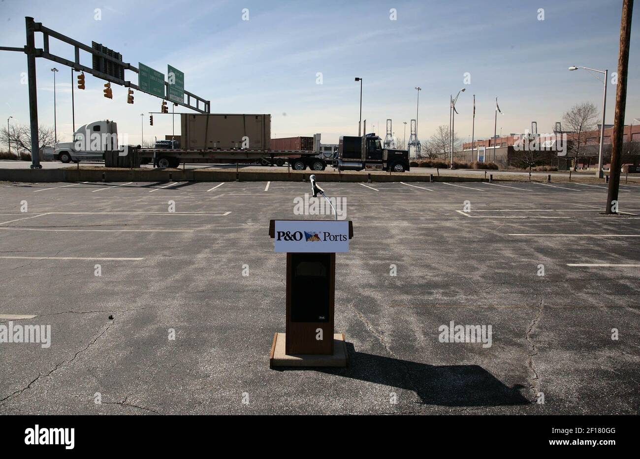 Port container traffic, shown in background, at the Seagirt Marine ...