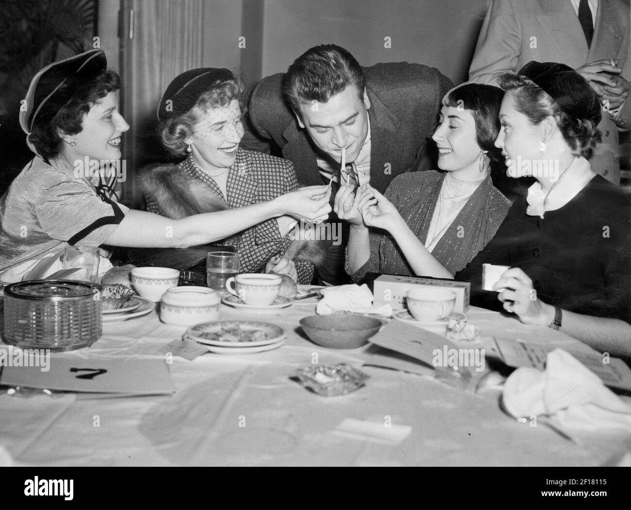 State Rep. Dan Rostenkowski gets a light at the luncheon of Cook County ...