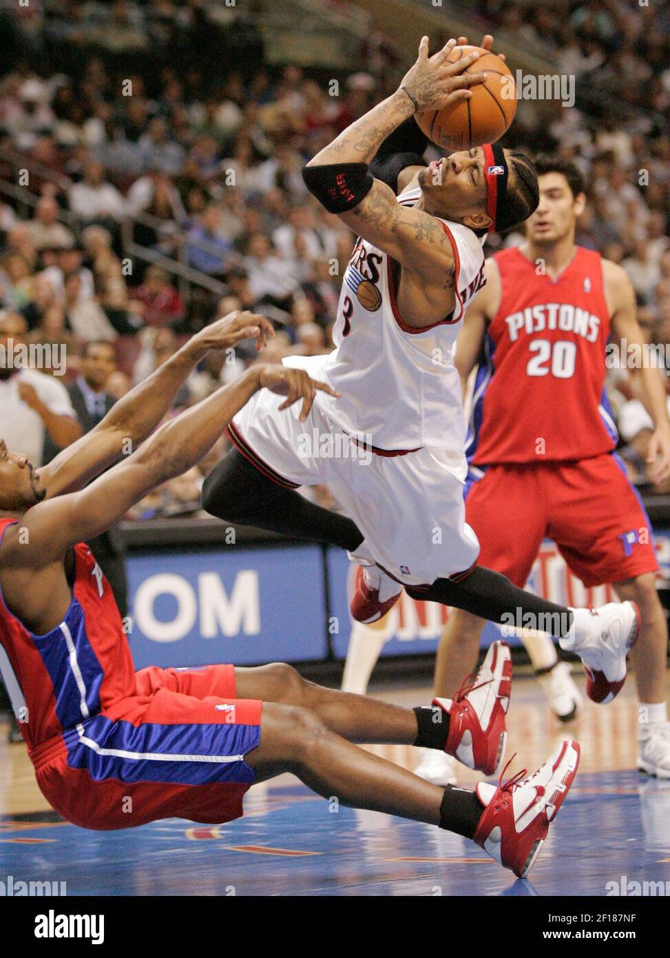 Detroit Pistons' Lindsey Hunter fouls Philadelphia 76ers' Allen Iverson ...