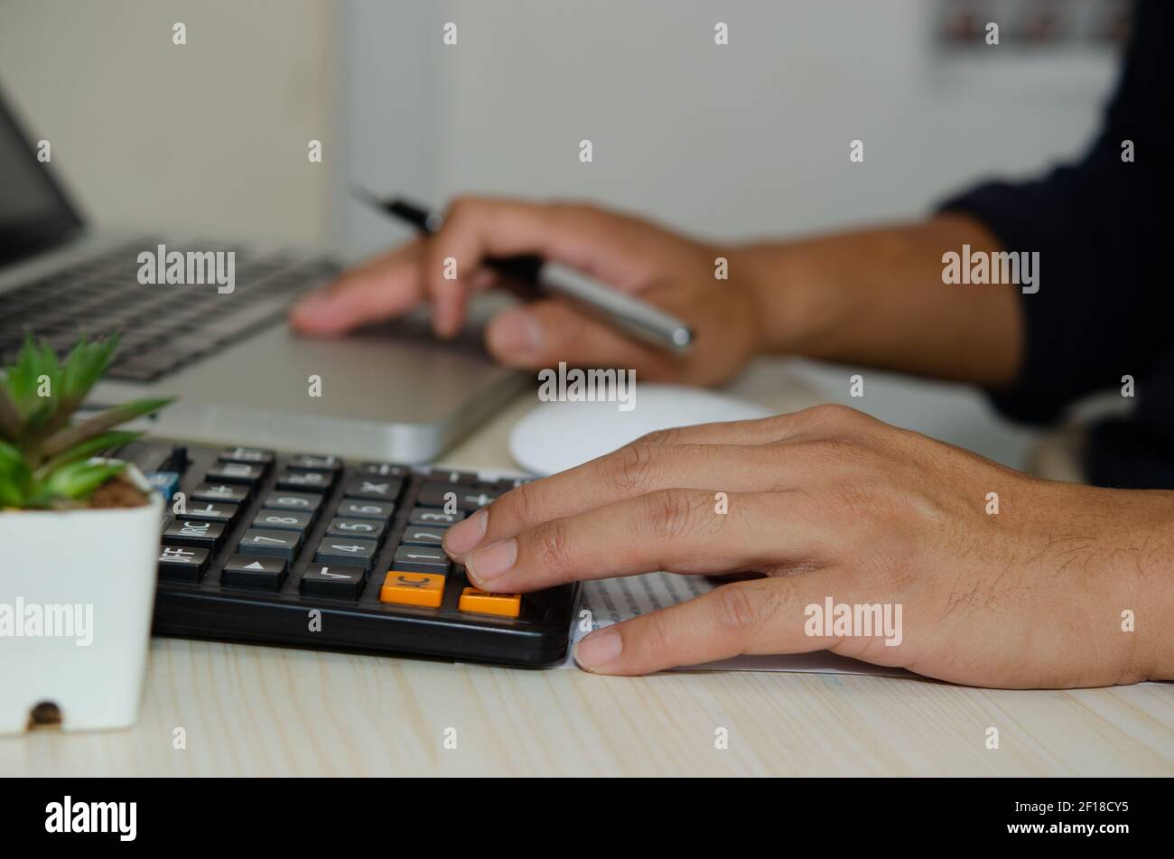 Hand touching financial report hi-res stock photography and images - Alamy